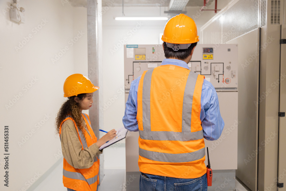 Engineer under checking the industry chilled water fan coil unit air ...