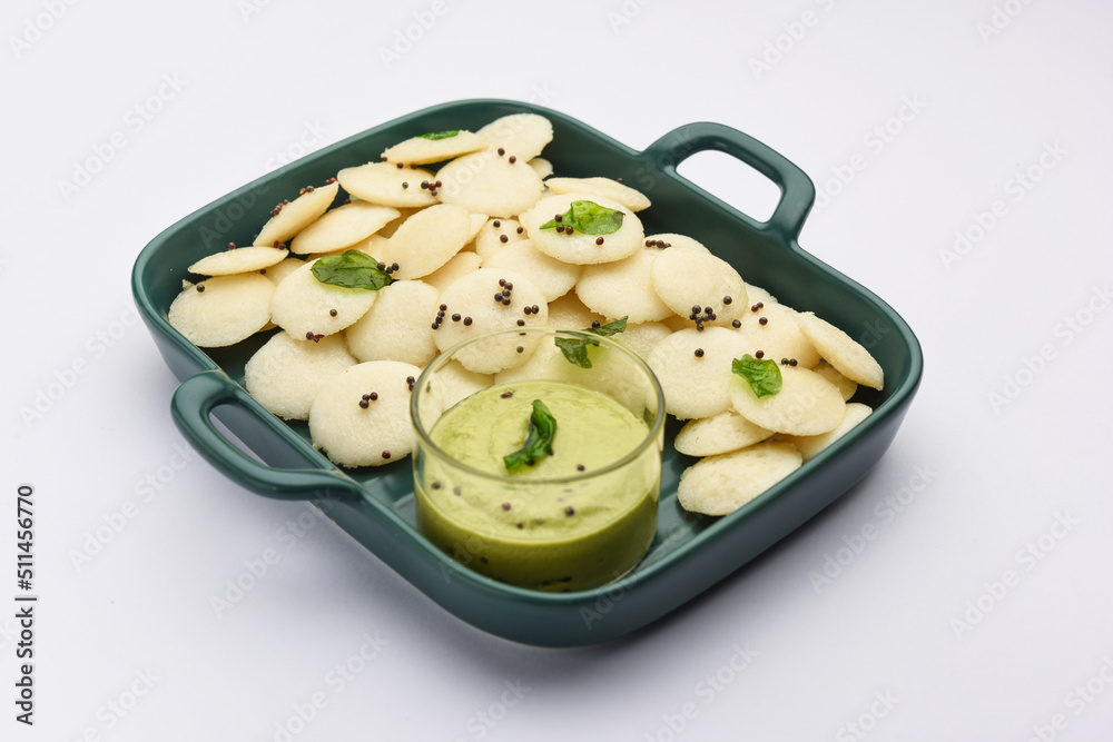Mini idli is the smaller version of soft and spongy round shaped ...