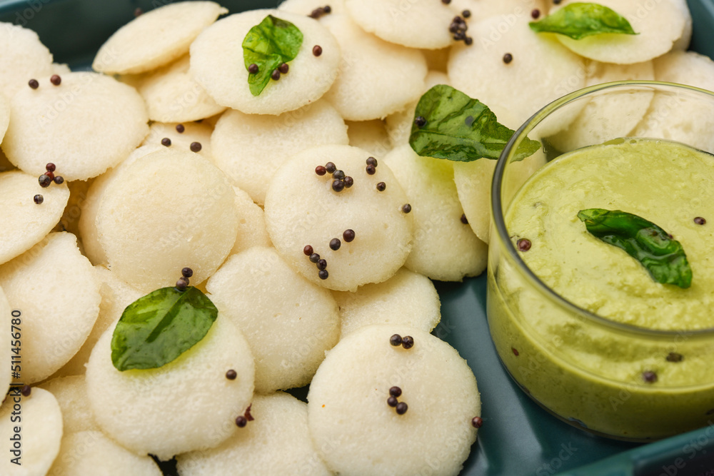 Mini idli is the smaller version of soft and spongy round shaped ...