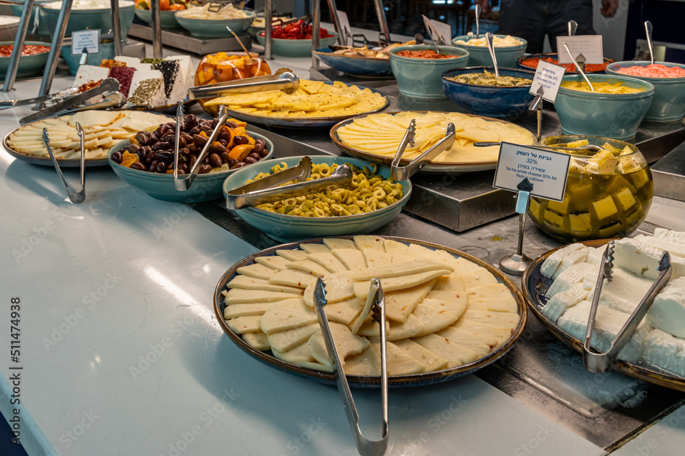 Typical Israeli breakfast buffet at any hotel. Hard cheese buffet with ...