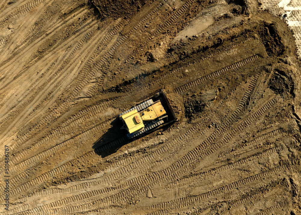 Bulldozer at mine reclamation once mining sand is completed. Land ...