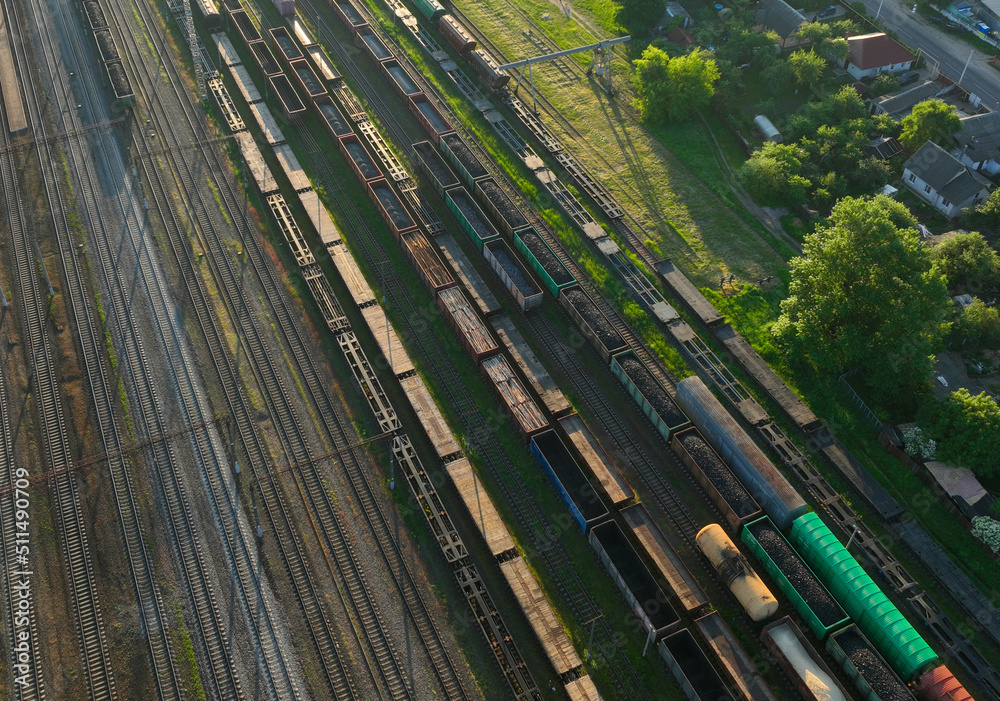 Railway yard with freight rail wagons. Cargo trains with goods on ...
