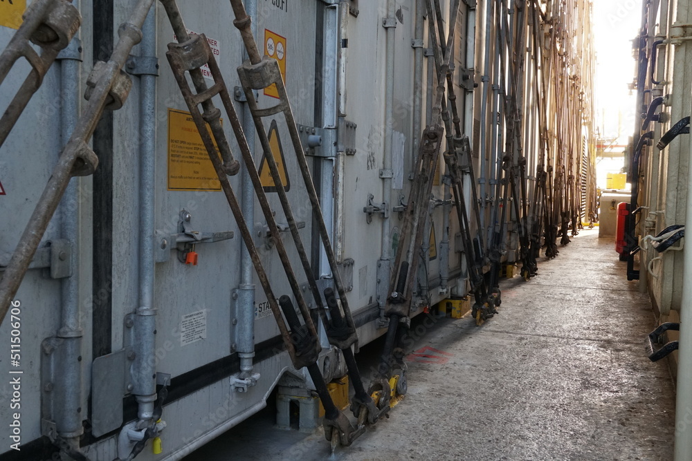 Row of the containers from different shippers secured on main deck of ...