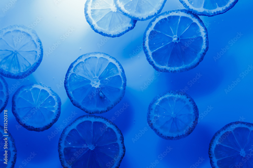 Abstract blue image of lemon slices. Blue lemon background. Stock Photo ...