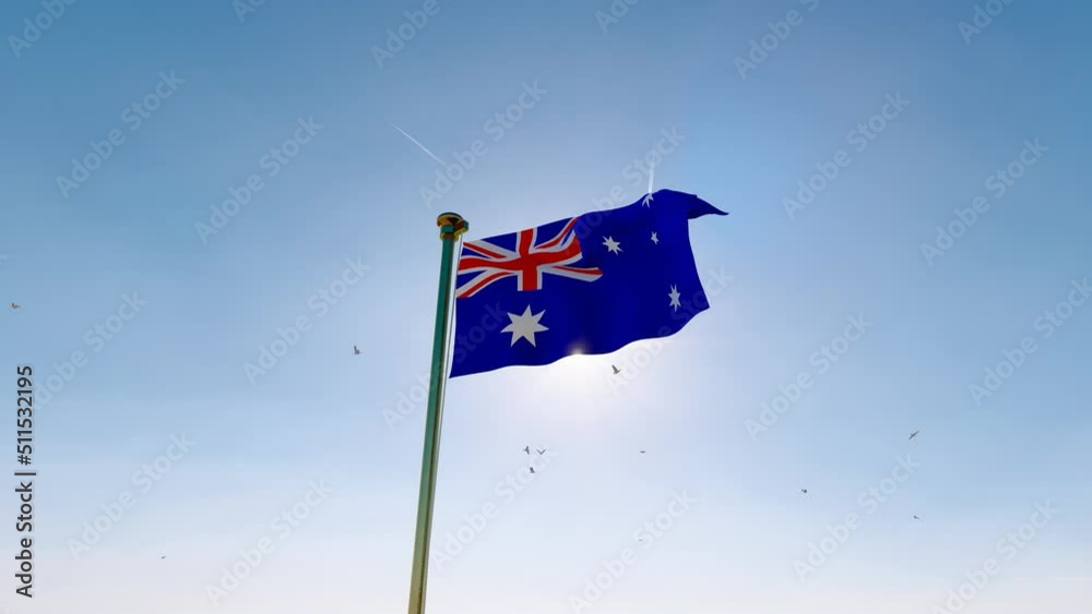 Flag of Australia waving in the wind, sky and sun background. Australia ...