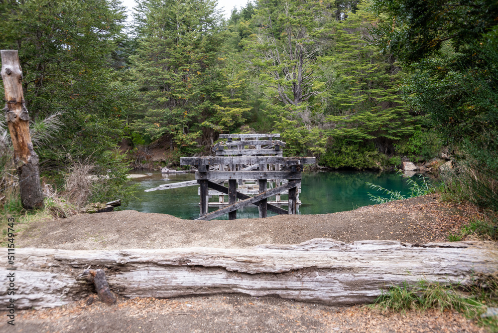 View of the remains of the old wooden bridge that crossed the Ruca ...