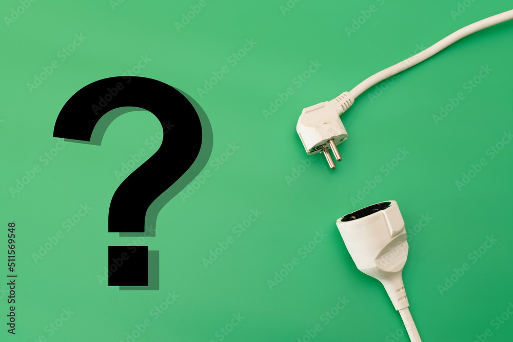 electro plug and socket with question mark on green background Stock ...