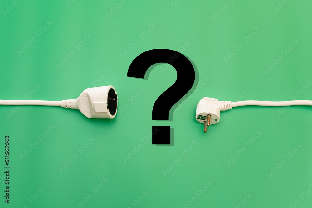 electro plug and socket with question mark on green background Stock ...