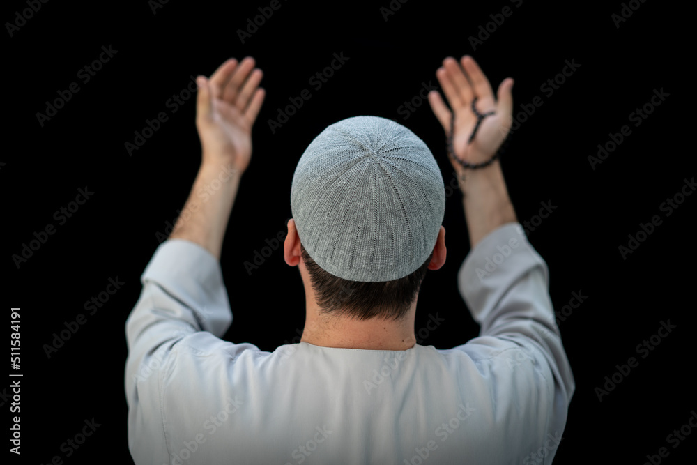 Muslim man standing and praying in the front of Kaaba in Mecca, KSA ...