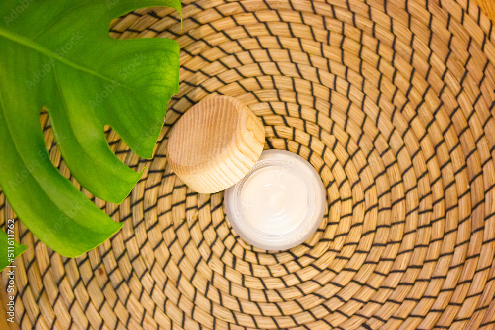 Natural cosmetic background. Jar with white cream for face, eyelids ...