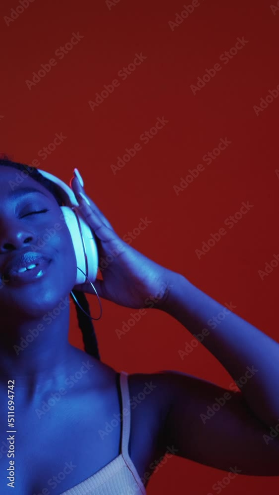 Stereo technology. Inspired black woman. Enjoying music. Sound magic ...