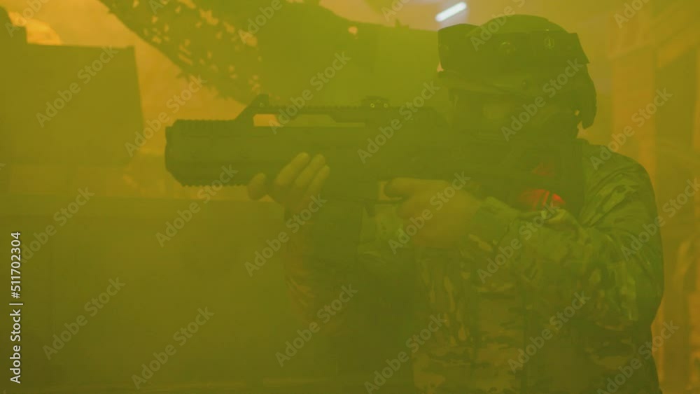 Side view of portrait of special force soldier or laser tag player ...