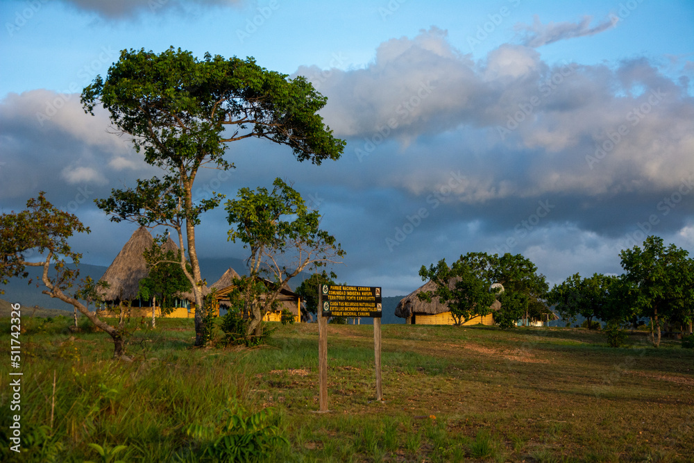 Community of the Pemon Indians in the Canaima National Park. thatched ...