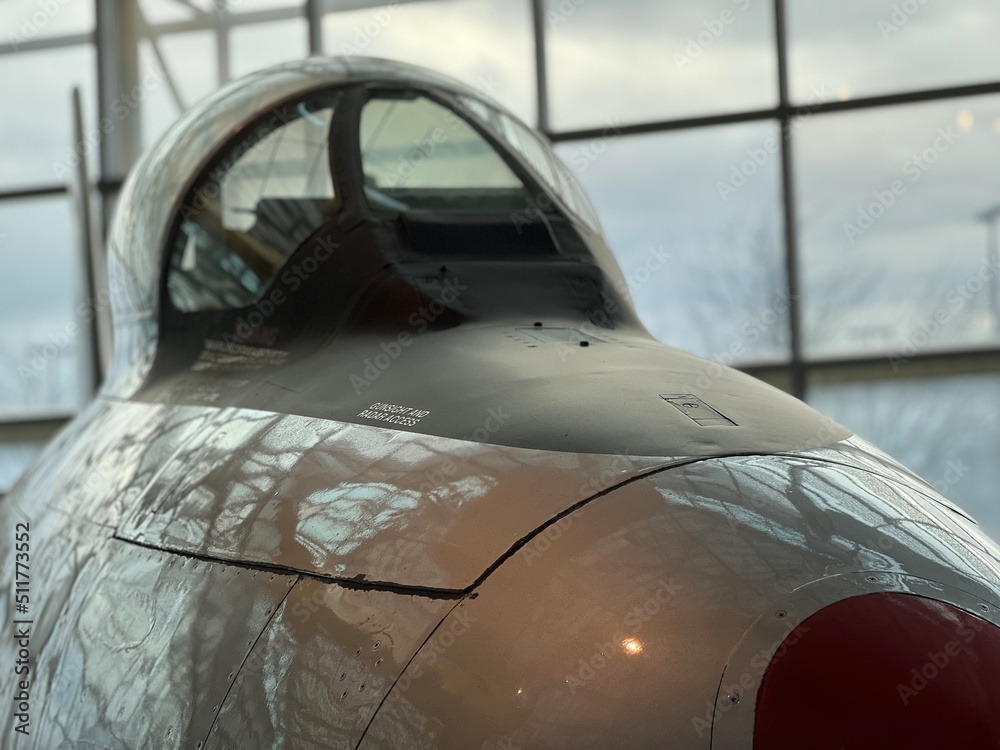 Shallow depth of field view of a jet fighter cockpit, with the words ...