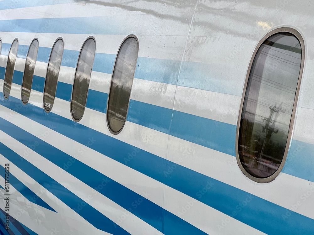 Detail of fuselage of Boeing 787 Dreamliner exterior, with blue and ...