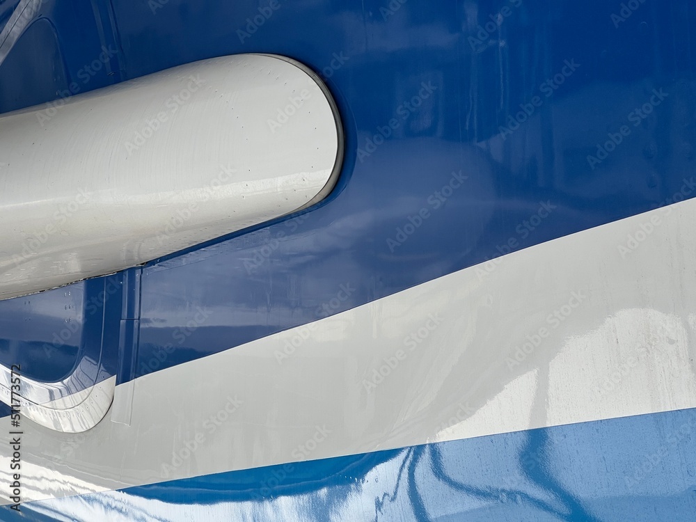 Detail of fuselage of Boeing 787 Dreamliner exterior, with light and ...