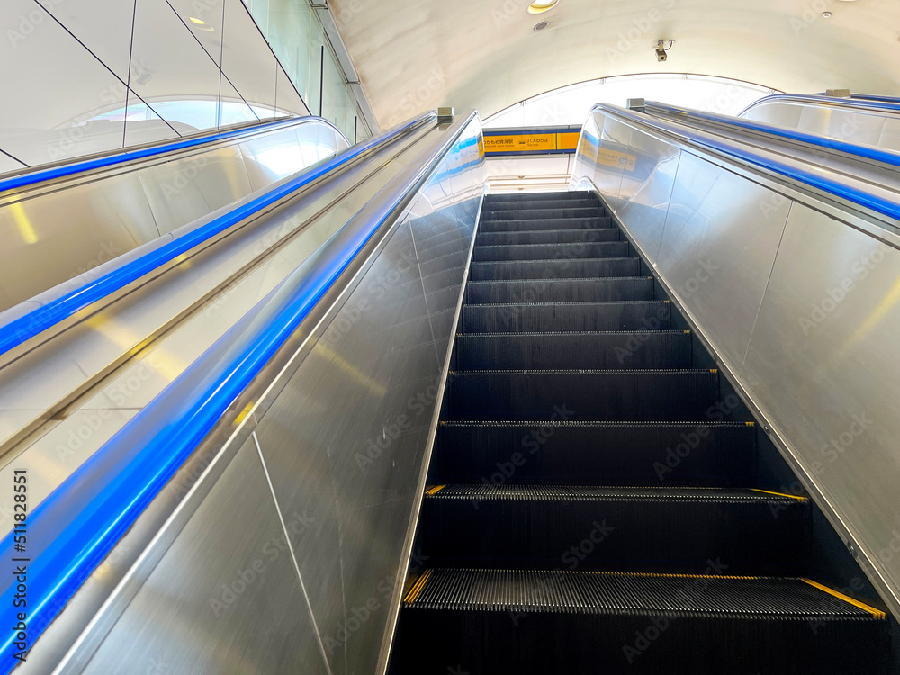 the entrance and escalator of Tokyo Teleport Station of Rinkai line ...