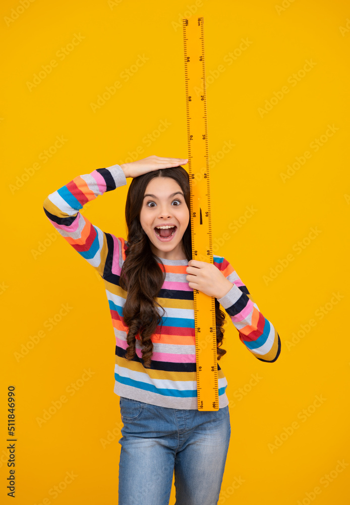 Kid height measure, growth measurement. Schoolgirl in school uniform ...