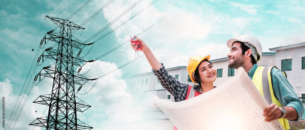 Team of electrical engineer stands at a power station for planning work ...
