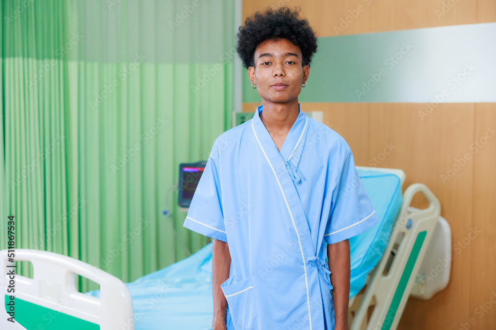 Portrait black man patient standing and look at camera at medical ...