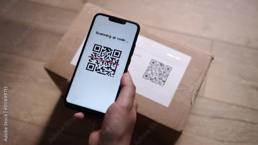 Scanning QR Code on Cardboard Parcel Using Cell Phone Indoor at ...