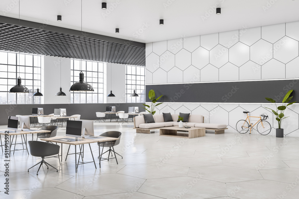 Perspective view on sunlit open space office with monochrome interior ...