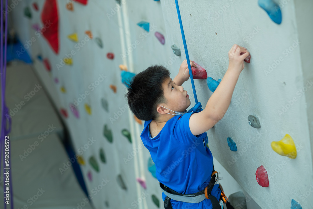 kid climbing a wall, children rock climbing Stock Photo | Adobe Stock