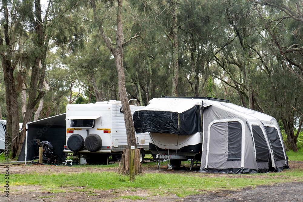 Various RV caravan camper on a campsite at the holiday caravan park ...