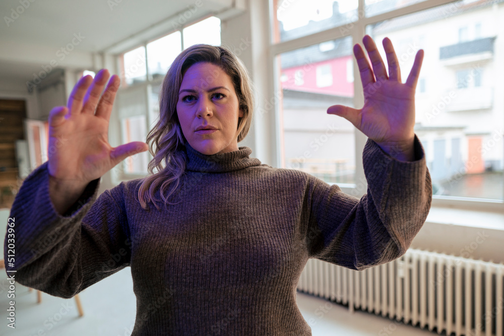 Plus size businesswoman doing hand gestures in office Stock Photo ...