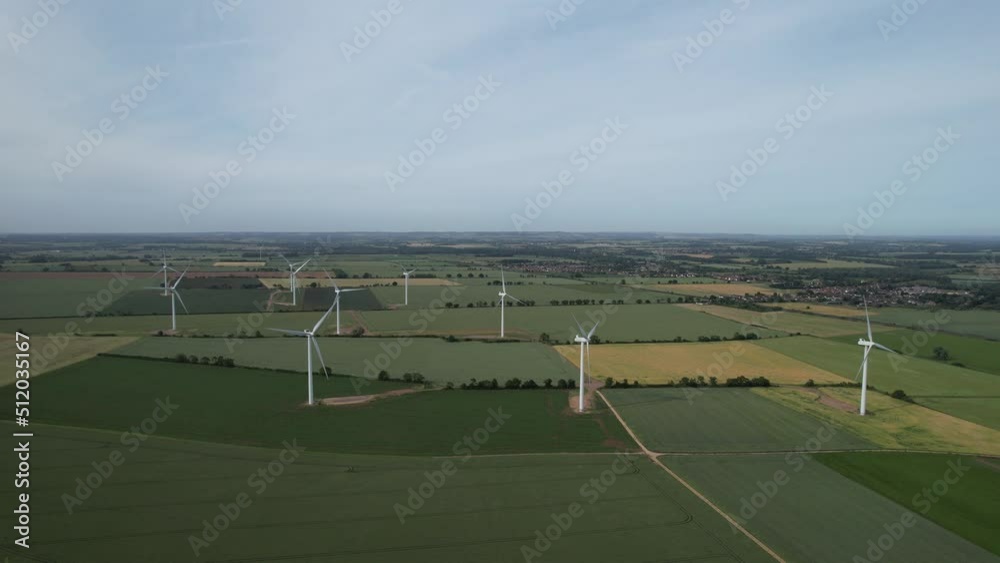 Gorgeous aerial view of renewable power generator windmills and solar ...