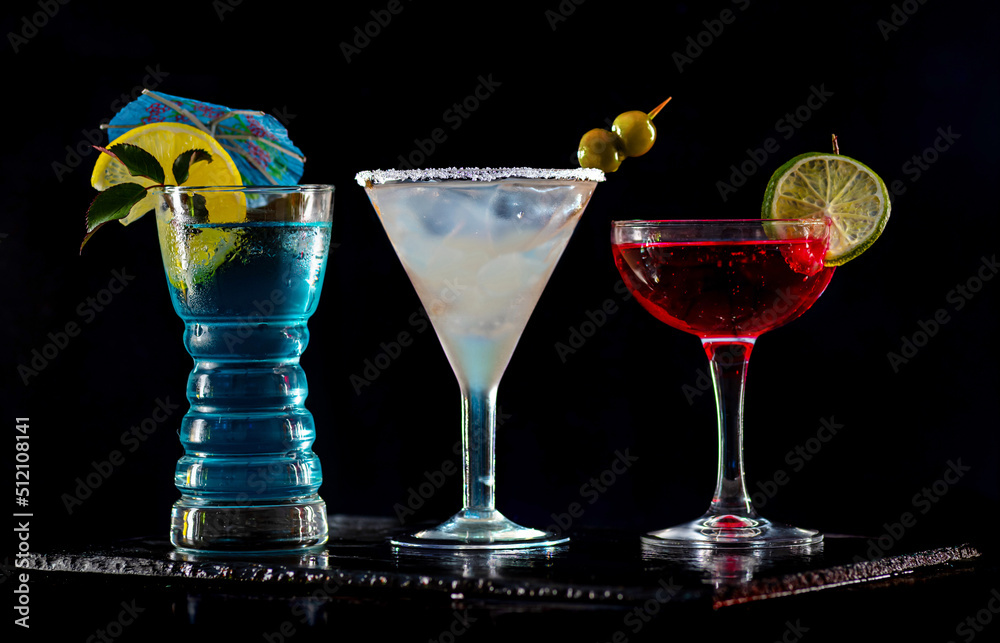 Cocktails set, collection on bar counter in a restaurant, pub. Fresh ...