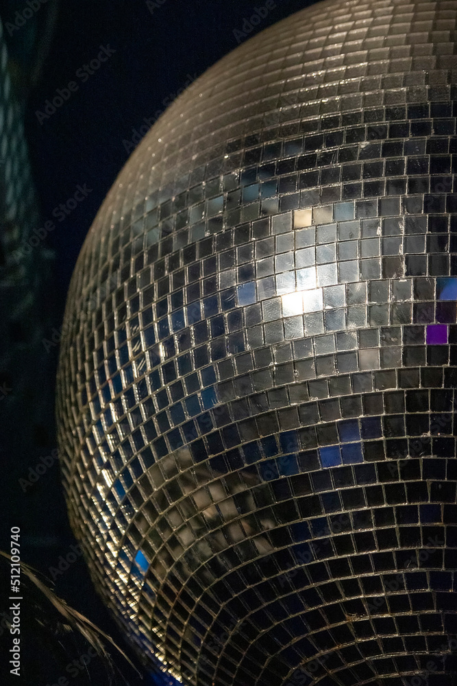 Disco ball in a dark room. Party and having fun concept in a club ...