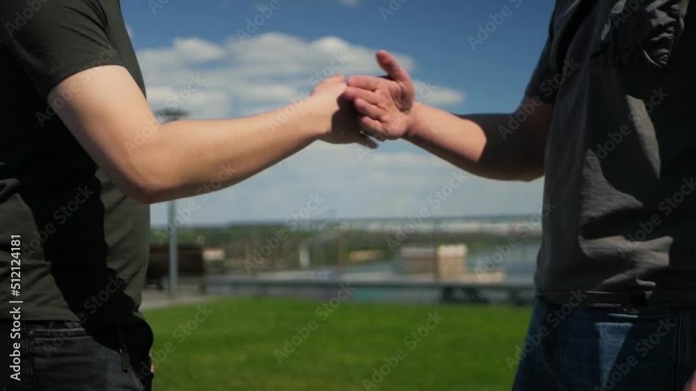 Vidéo Stock Two white guys greeting each other with cool modern ...