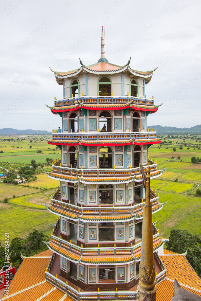 Chinese Pagoda and surrounding countryside with mountains and paddy ...