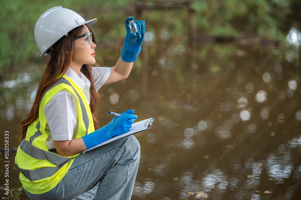 Environmental engineers inspect water quality,Bring water to the lab ...