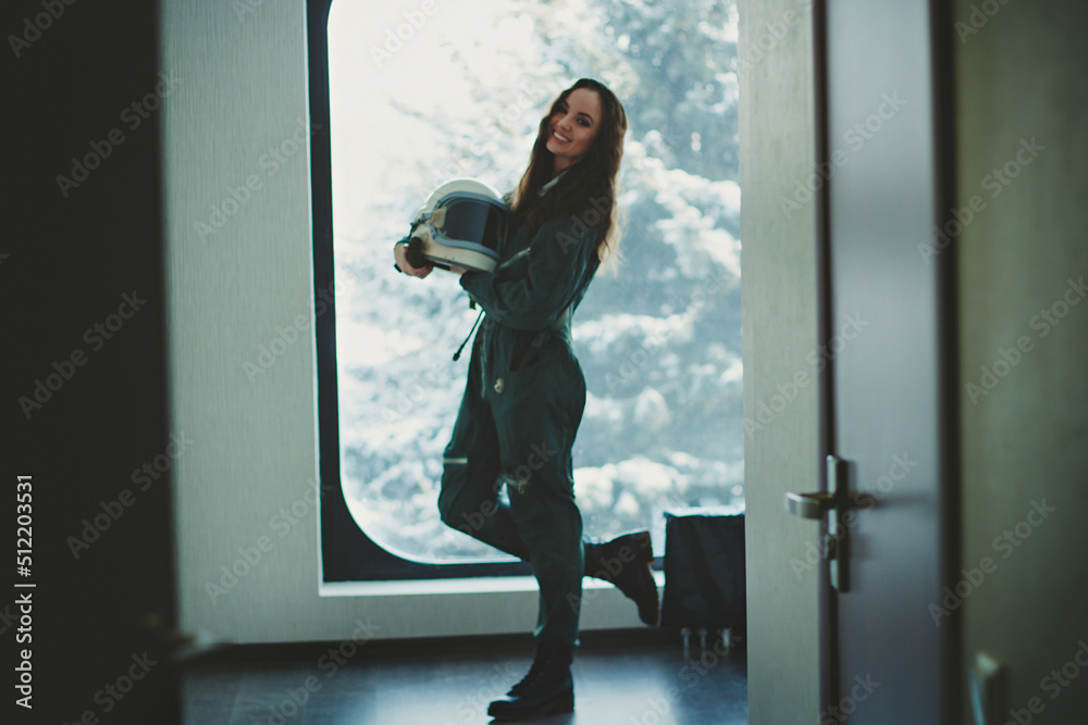 Astronaut girl in space helmet. Happy girl smiling. Young girl in an ...