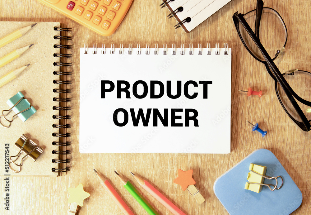 PRODUCT OWNER . Text written on the notepad with office tools and ...