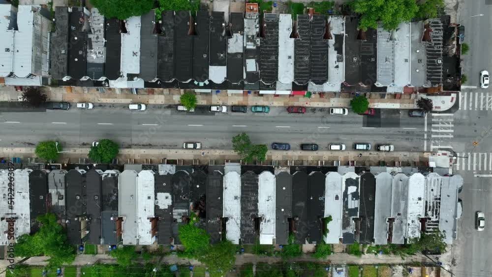 Top down aerial of rooftop view of rowhomes in USA city. Urban setting ...