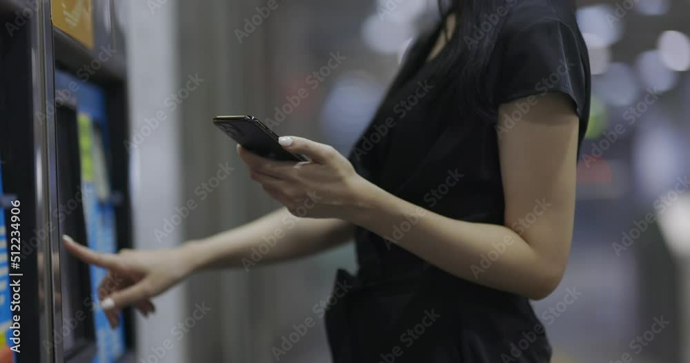 Cropped shot of young Asian woman scanning QR code, checking in at ...