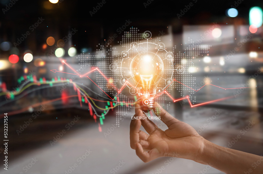 Energy crisis, Hand hold light bulb with energy resources icon and ...