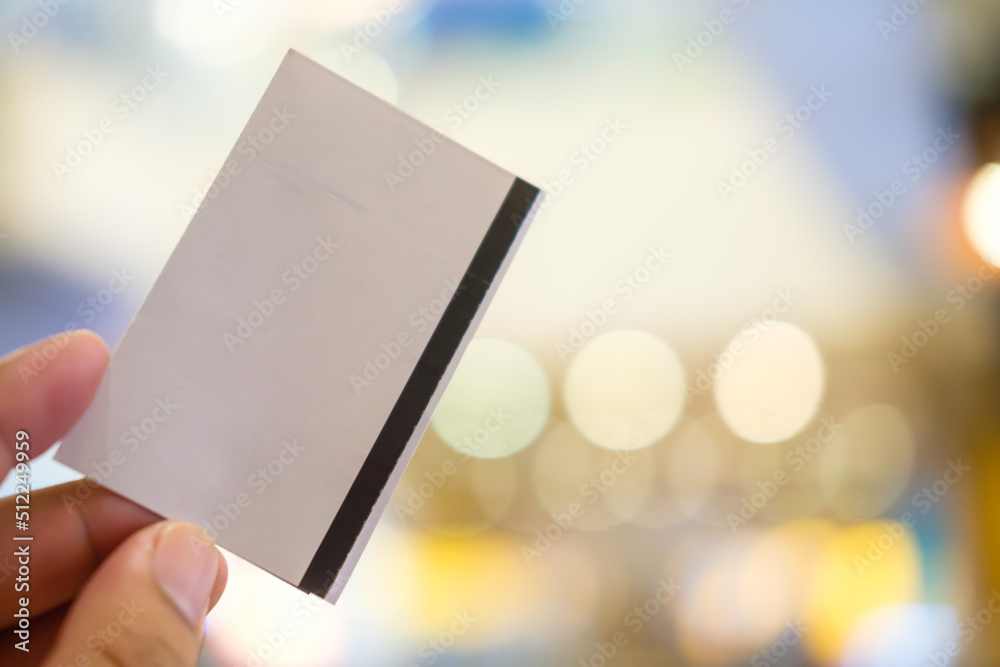 Man hand holding up a movie ticket. Blank template Stock Photo | Adobe ...