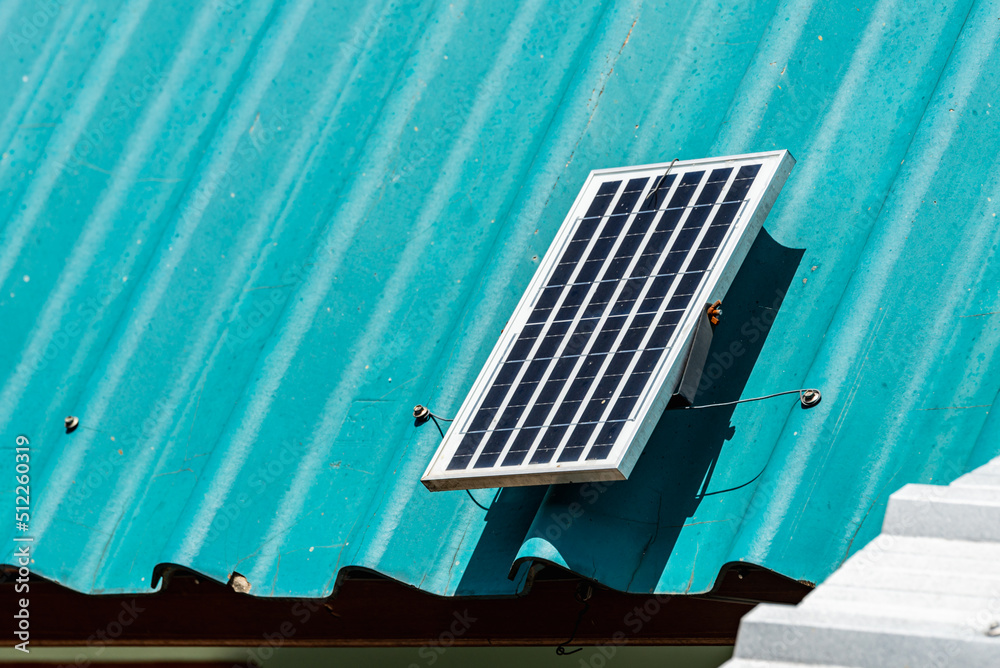 Solar cell, small panel installed on the roof of the house It is an ...