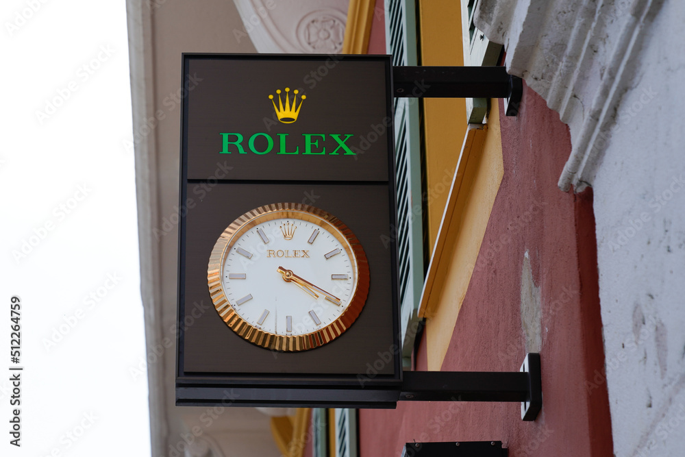 Rolex logo sign and text brand on big giant watch Swiss luxury ...