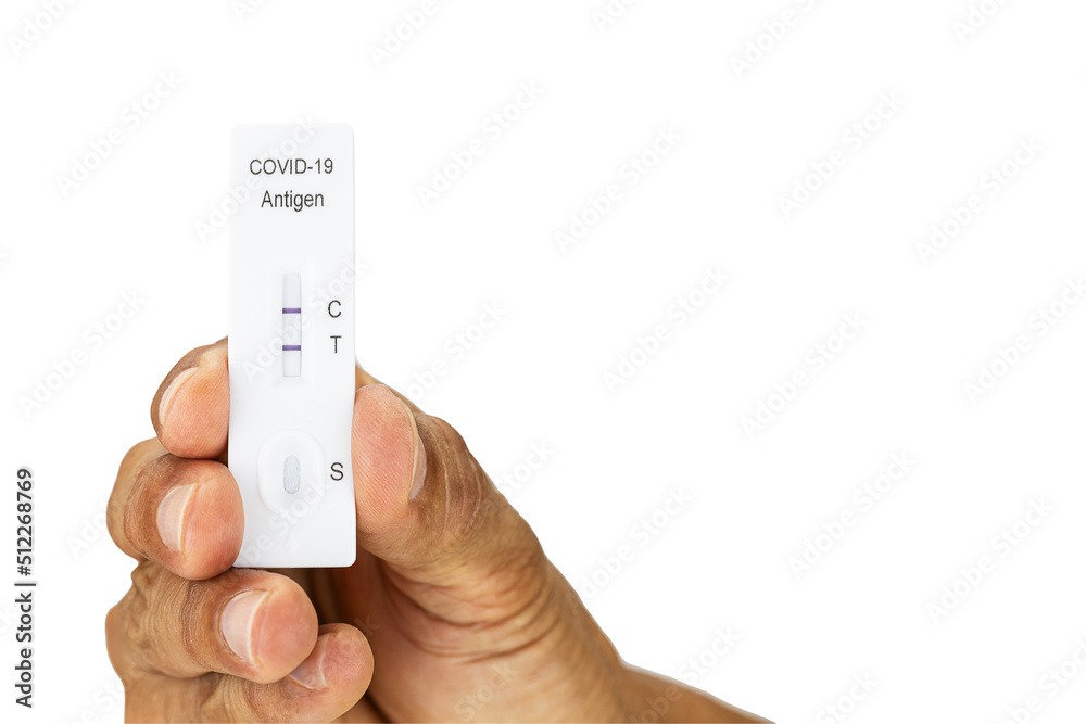 Hand showing Covid-19 self antigen rapid test kit with positive result ...