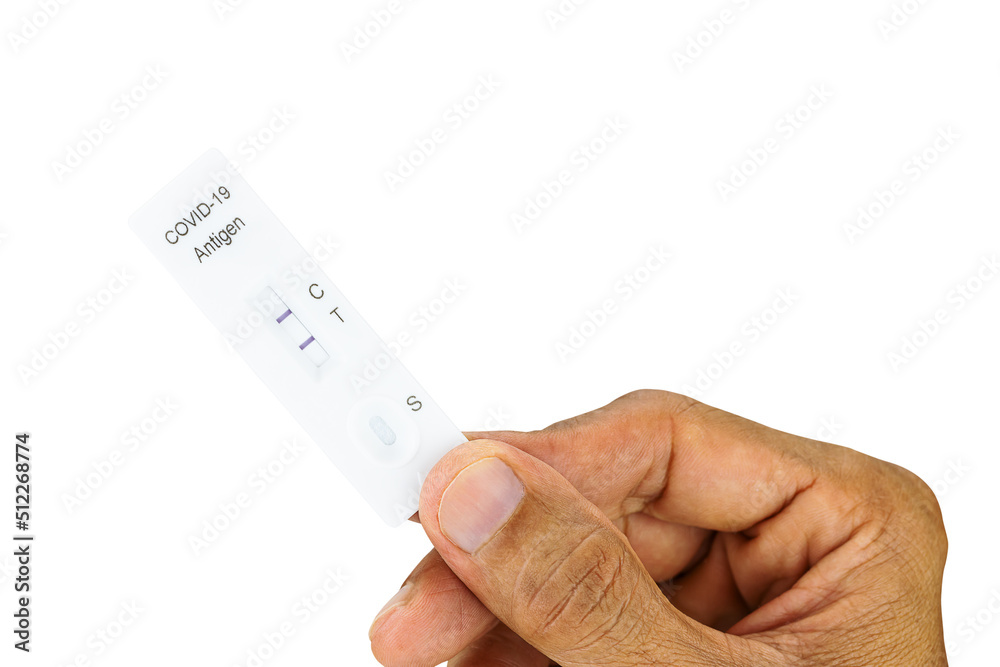 Hand showing Covid-19 self antigen rapid test kit with positive result ...