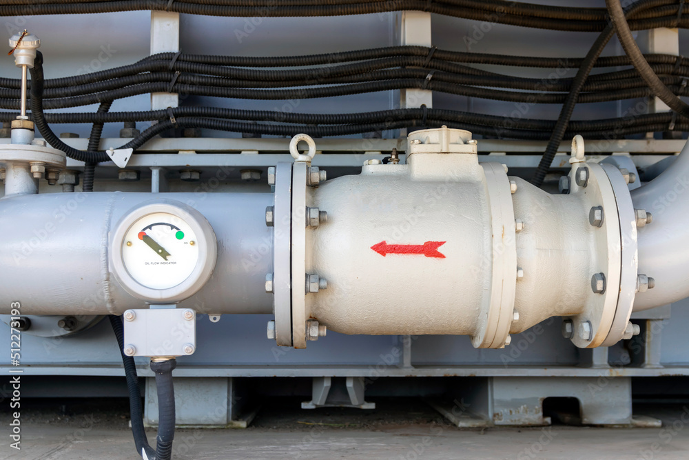 Oil pump of the transformer cooling system. Stock Photo | Adobe Stock