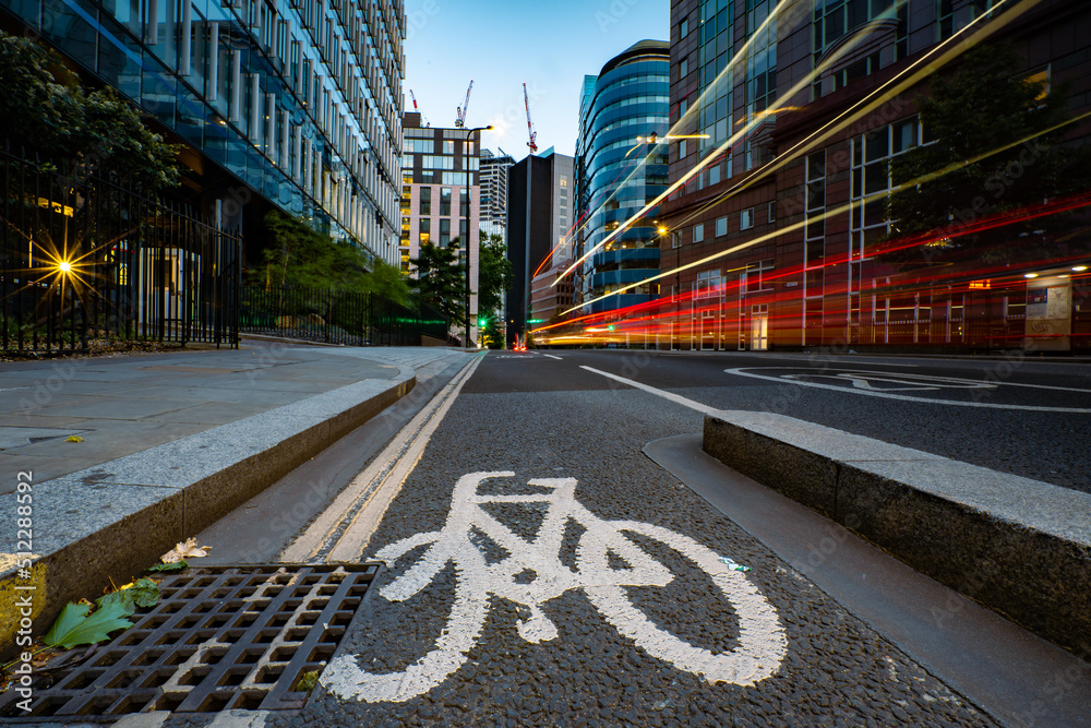 Cycle lane on a London street with light trails Stock Photo | Adobe Stock