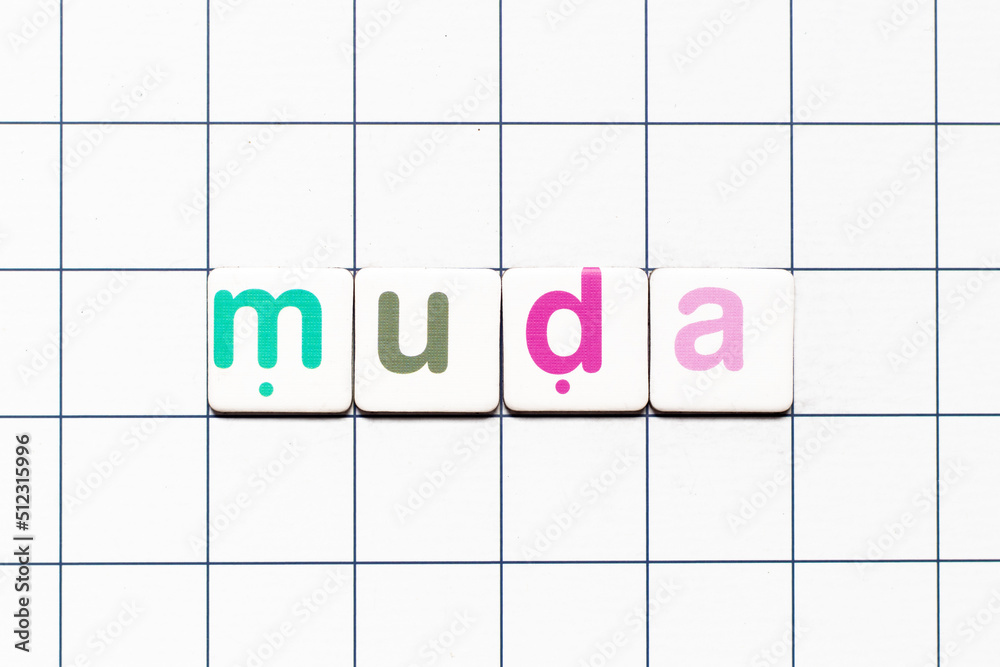 Colorful tile letter in word muda on white grid background Stock Photo ...