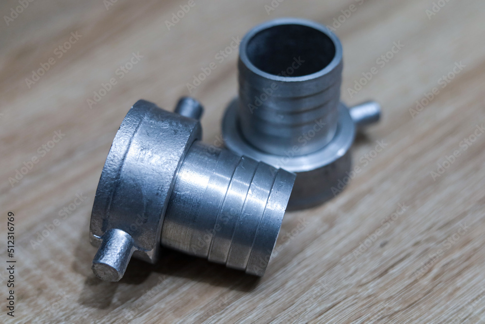 the threaded galvanized pipe connecting the pump and the hose is ...