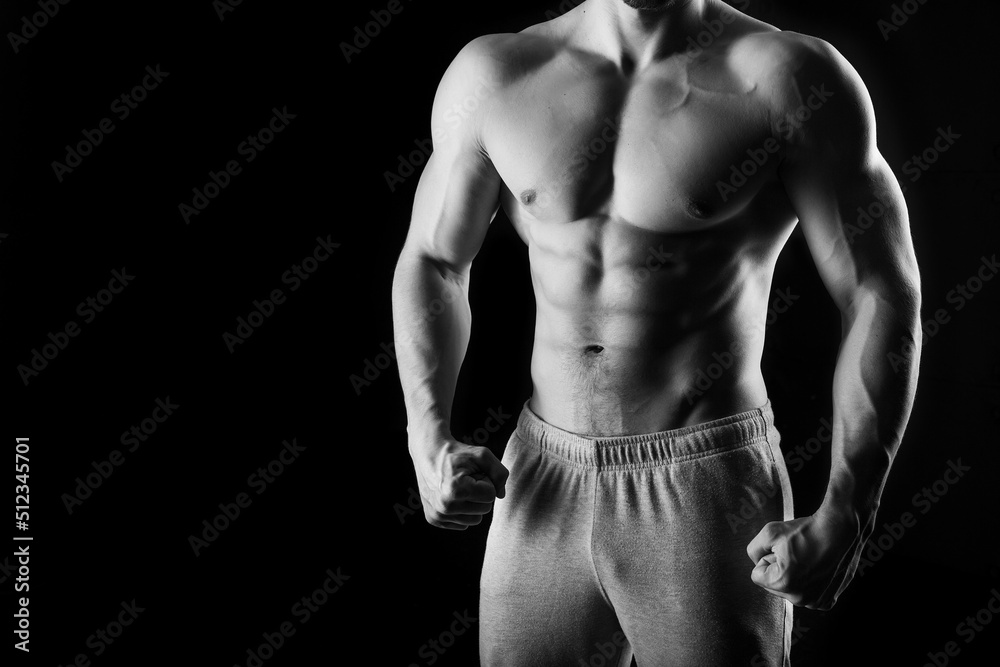 Muscular and sexy torso of young man having perfect abs, bicep and ...